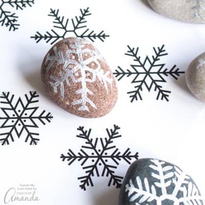 Snowflake Painted Rocks: an easy winter craft anyone can do