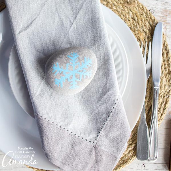 Snowflake Painted Rocks: an easy winter craft anyone can do